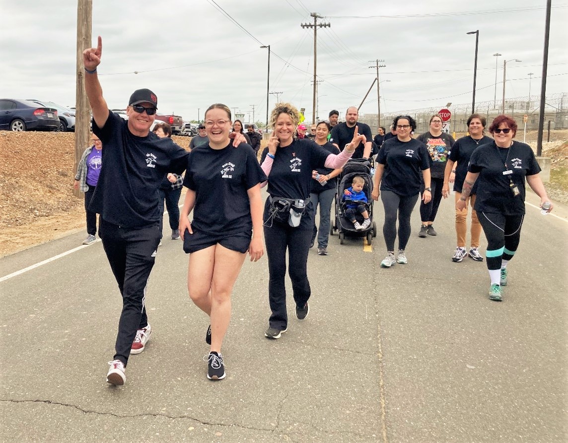 Mule Creek staff lace up shoes for Fun Run - Inside CDCR